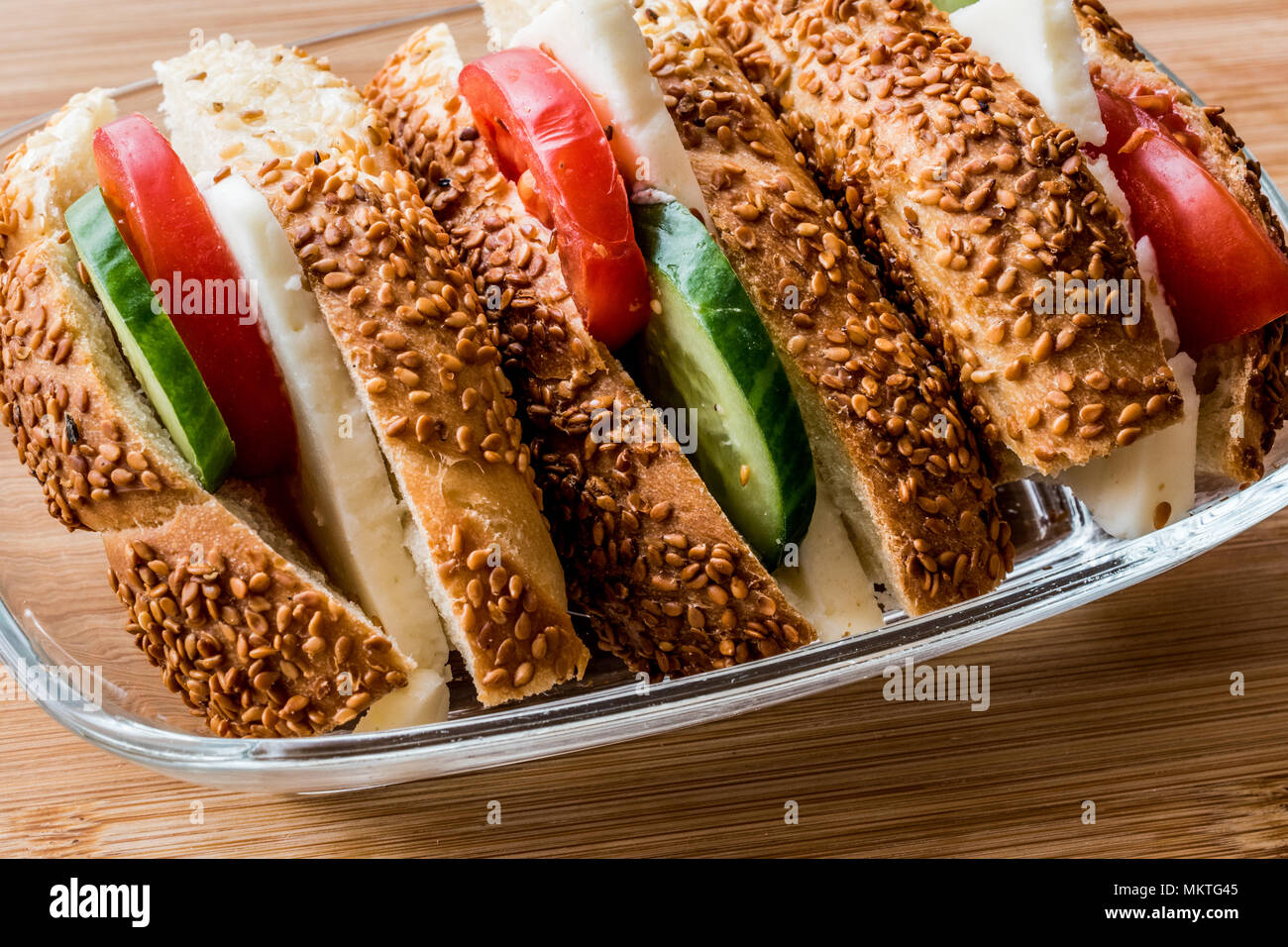Turkish Bagel Simit Sandwich with cheese, tomato and cucumber. fast ...
