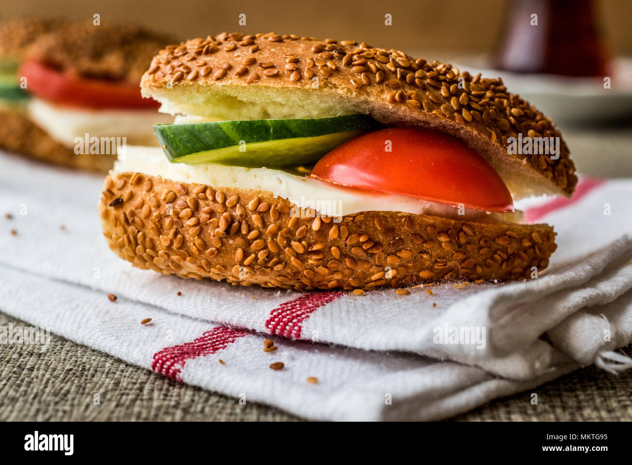Turkish Bagel Simit Sandwich with cheese, tomato, cucumber and tea ...