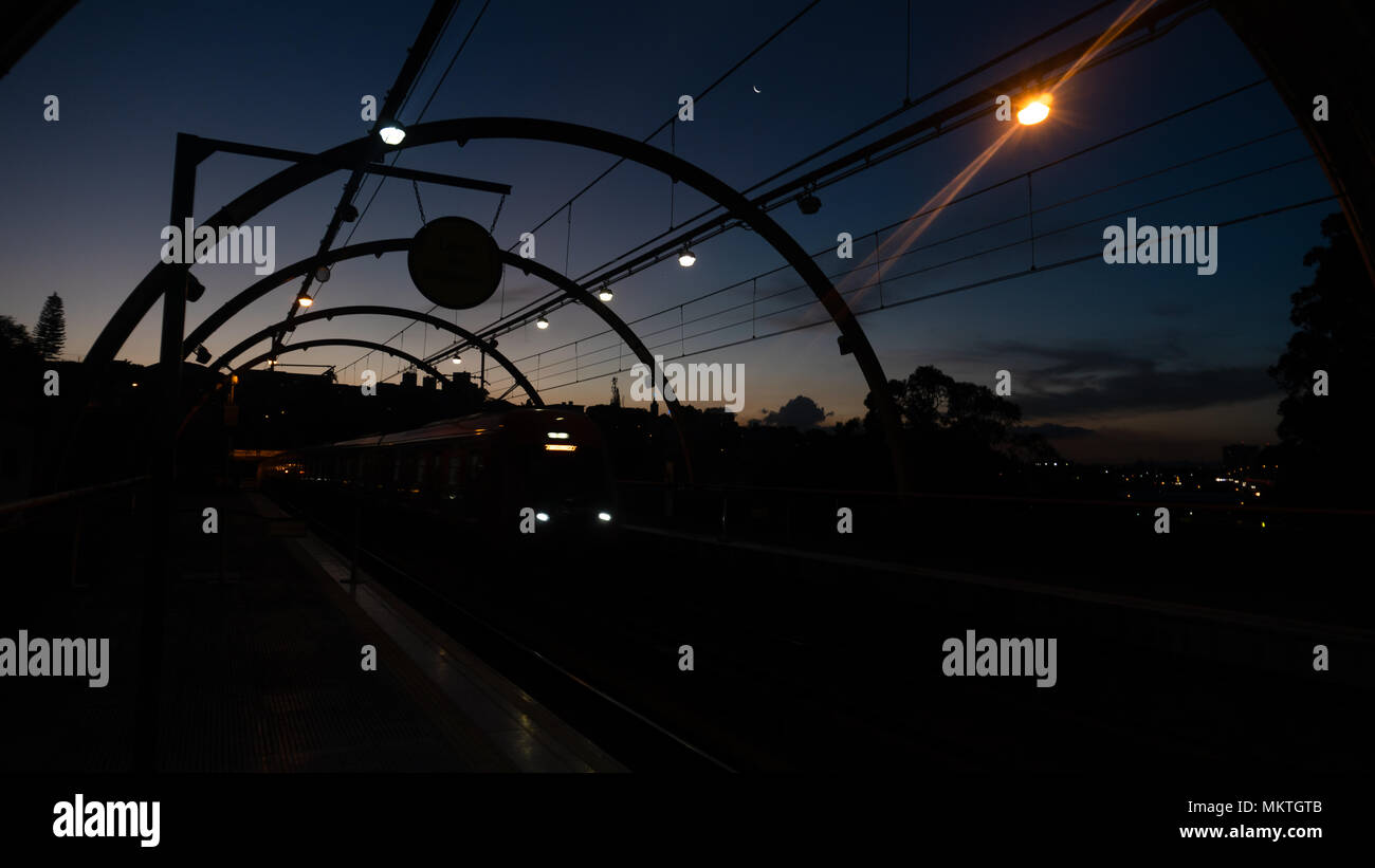 Little moon on a sunset view in a surface train station - São Paulo ...