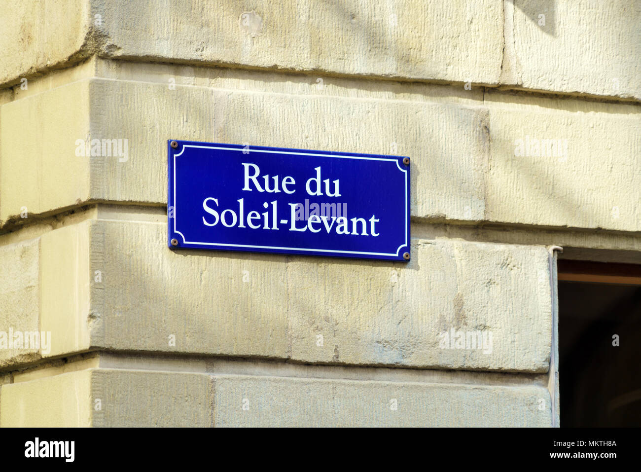 Typical street signs on the walls of the houses of the old city, Geneva ...