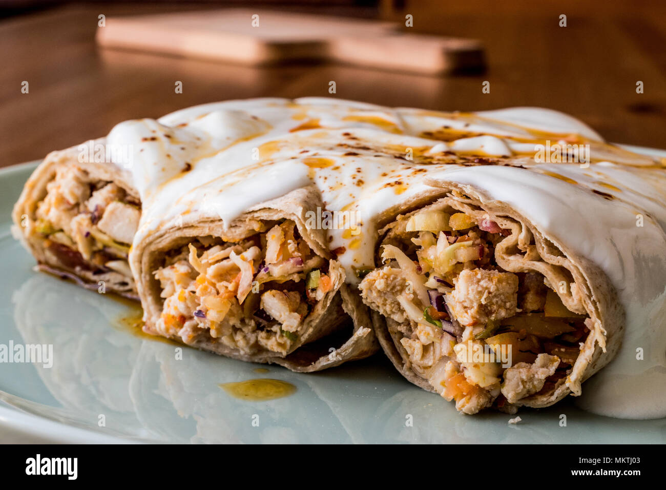 Chicken shawarma kebab with yogurt and fried butter sauce / Tantuni ...