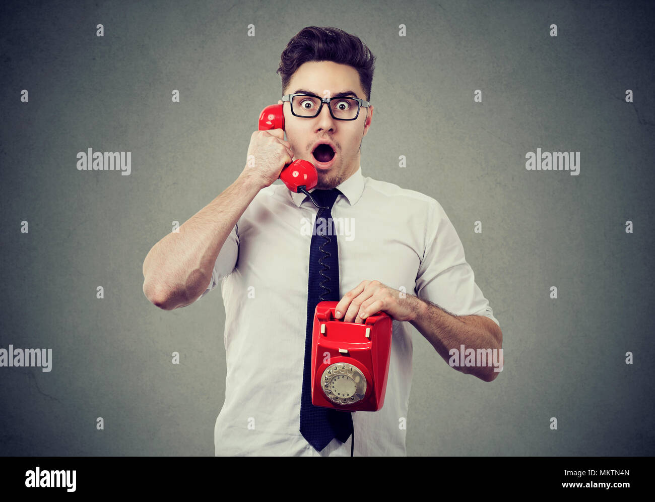 Man desk telephone shock hi-res stock photography and images - Alamy
