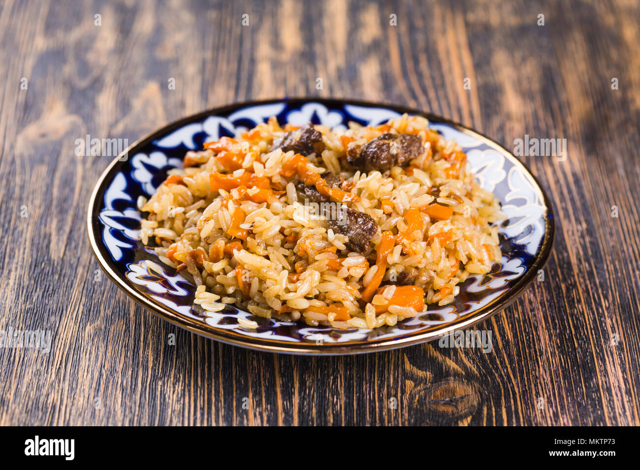 Traditional oriental pilaf. Central Asian cuisine Stock Photo - Alamy