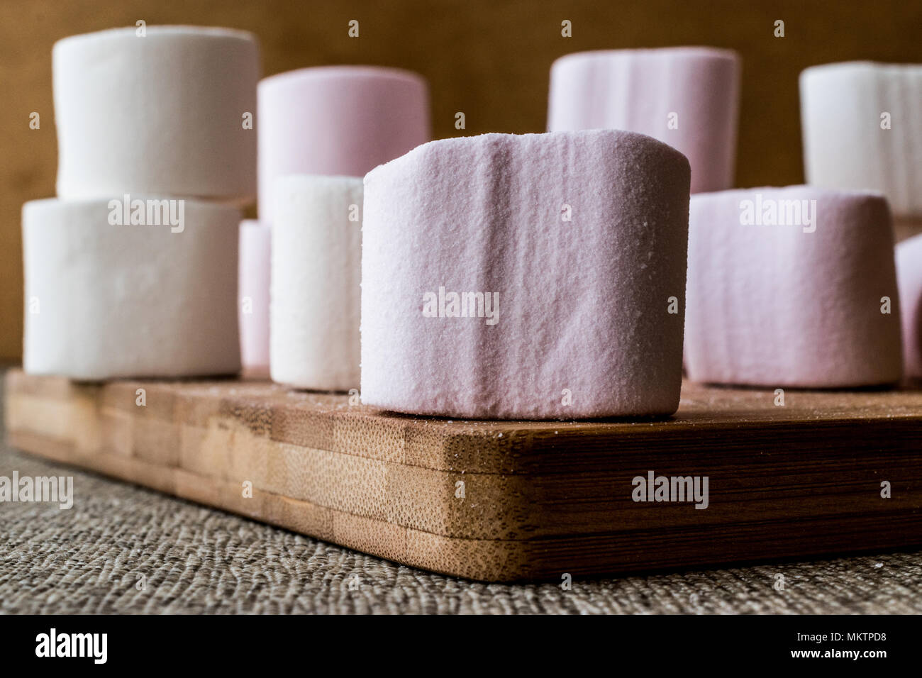 Stack of Marshmallows on wooden surface. dessert concept Stock Photo ...