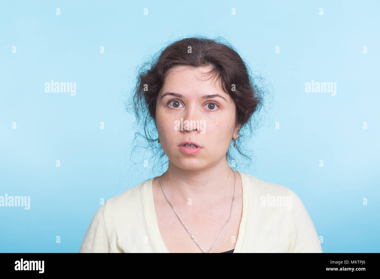 Concerned scared woman Stock Photo - Alamy