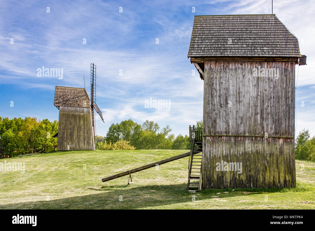 Traditional old polish windmills. Wooden and masonry, Spring, green ...