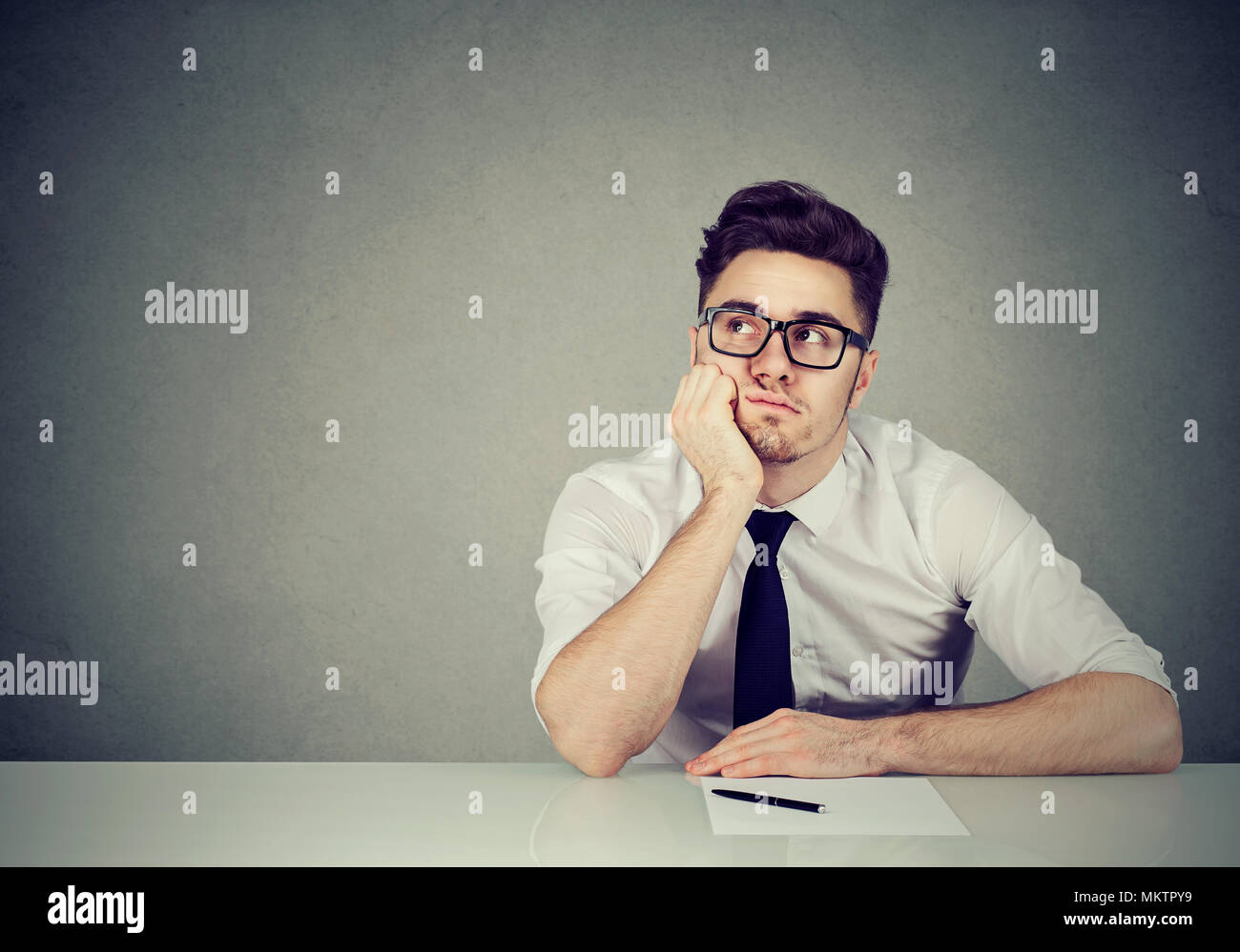 Employee wondering hi-res stock photography and images - Alamy
