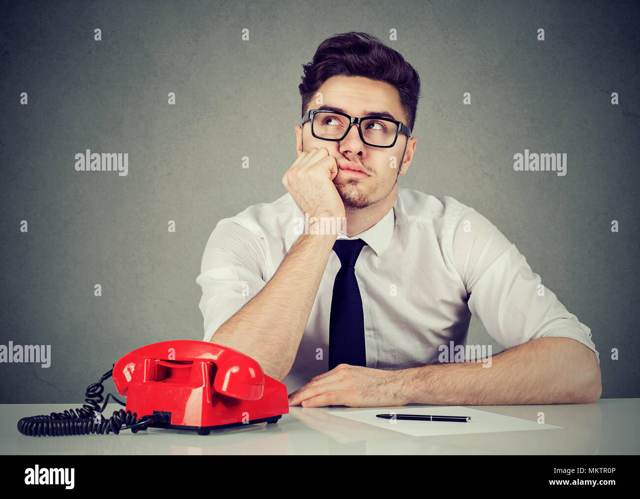 Employee wondering hi-res stock photography and images - Alamy