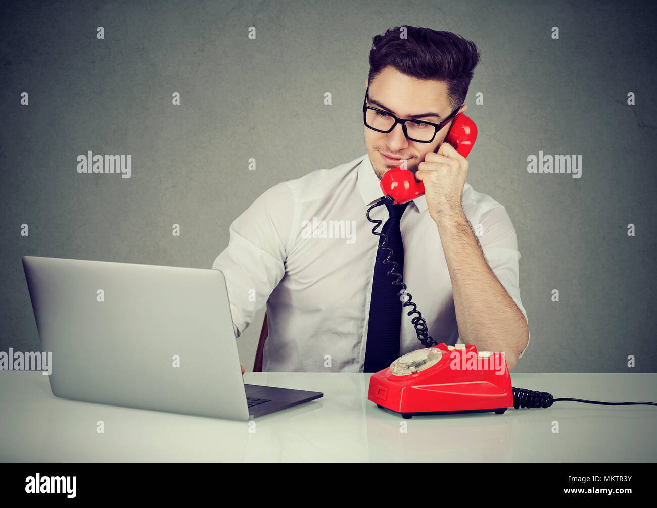Office man working help computer hi-res stock photography and images ...