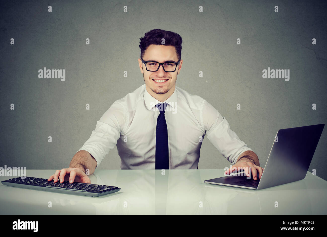 Happy employee hi-res stock photography and images - Alamy