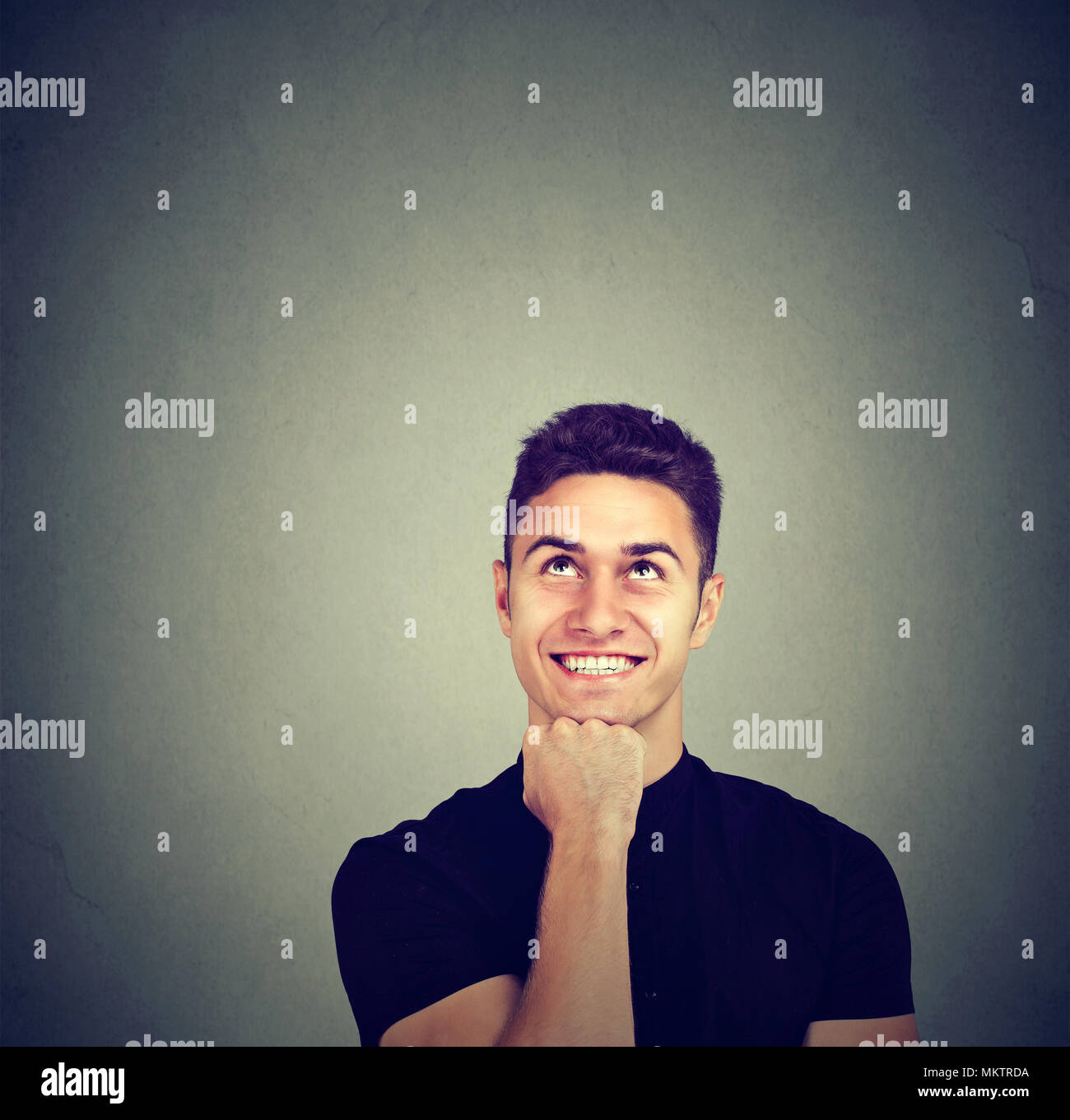 Young man pondering hi-res stock photography and images - Alamy