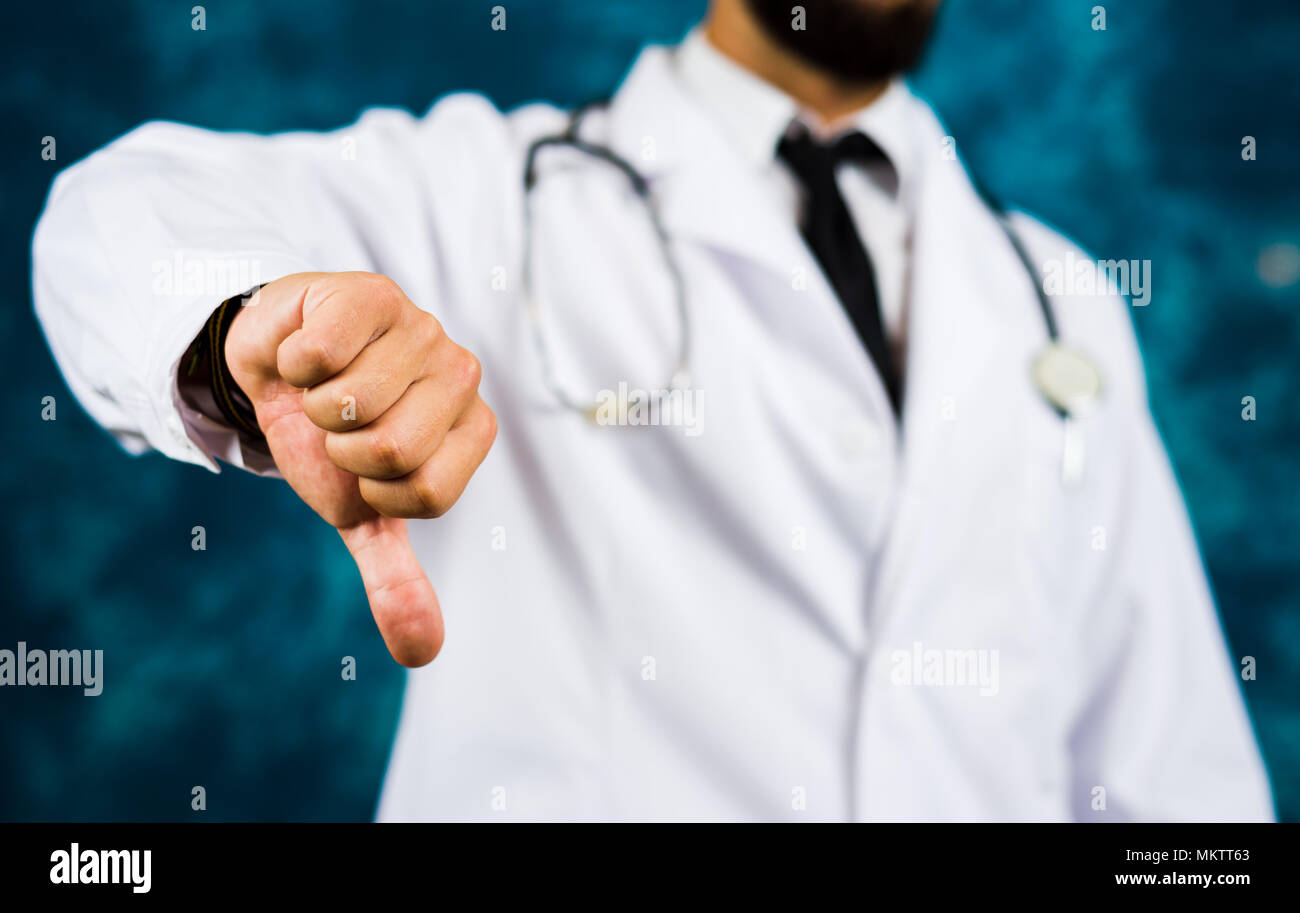 Doctor down thumbs hi-res stock photography and images - Alamy