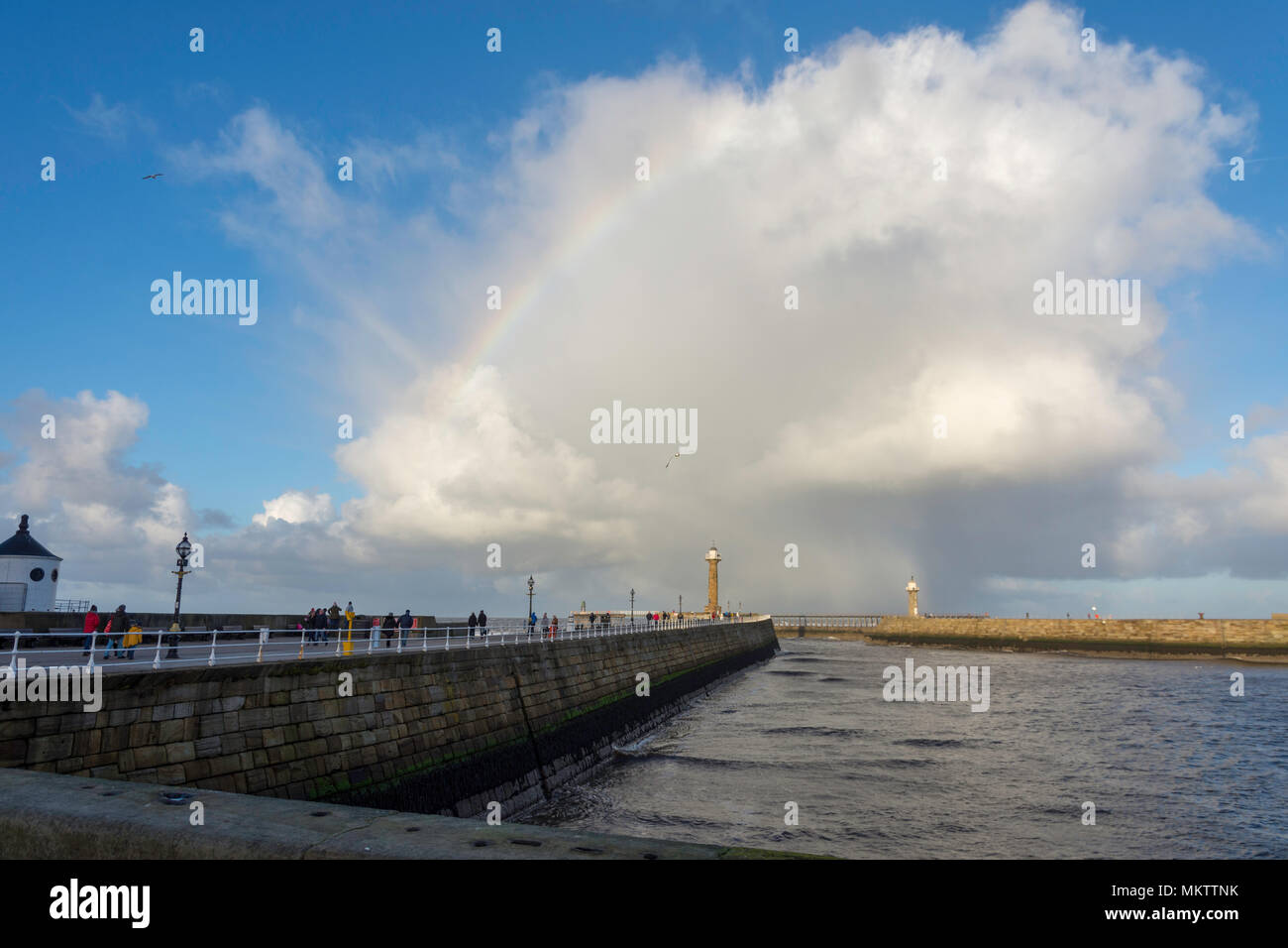 Rainbow over Whitby pier Stock Photo - Alamy