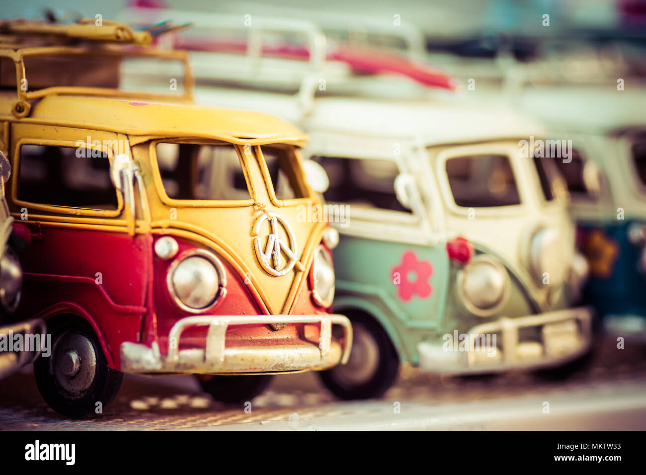 Vintage miniature vans in vintage color tone, travel, hippie style ...