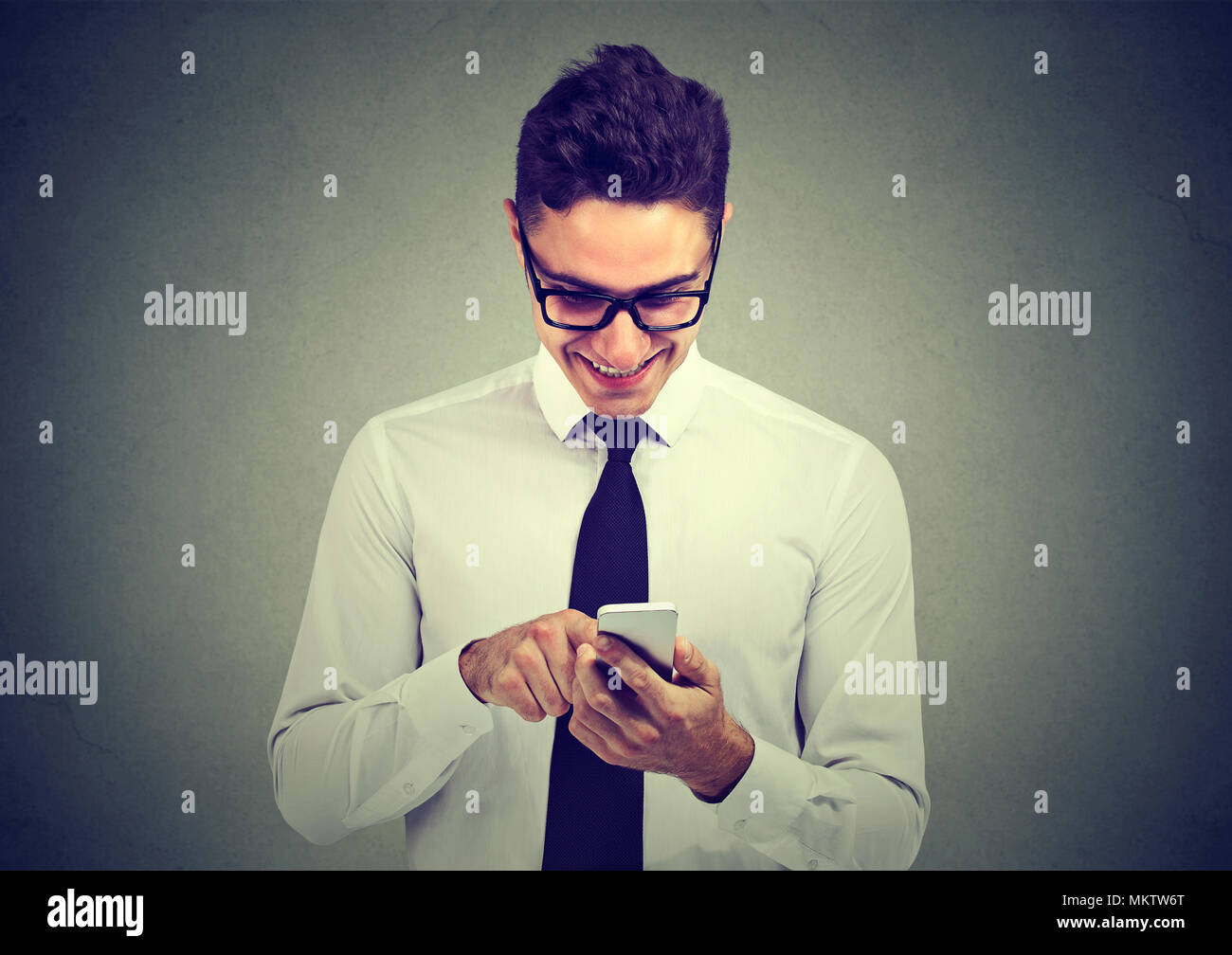Handsome businessman using phone hi-res stock photography and images ...