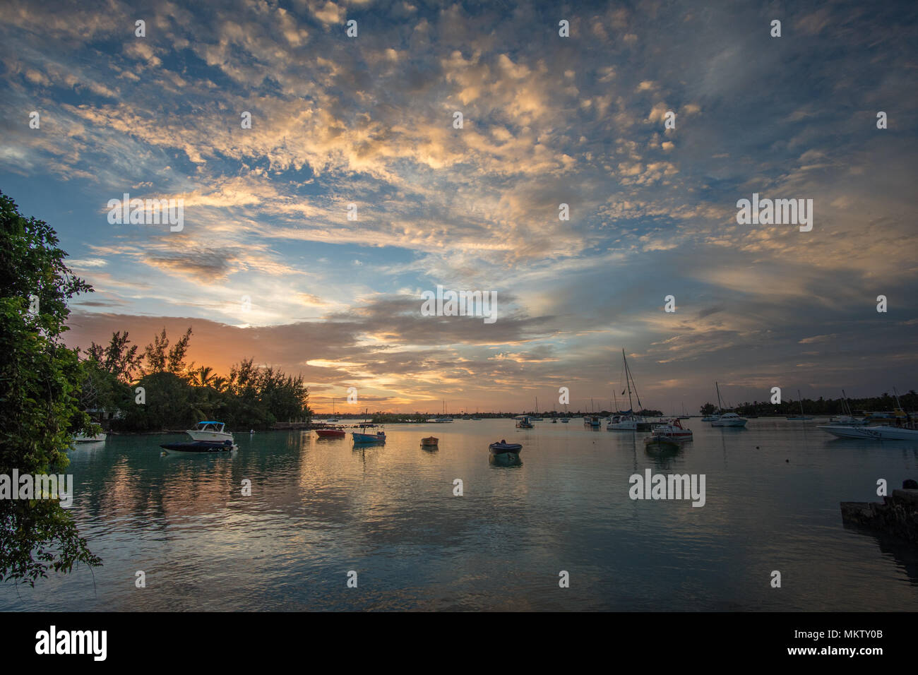 Sunset on the beach on Mauritius island Stock Photo - Alamy