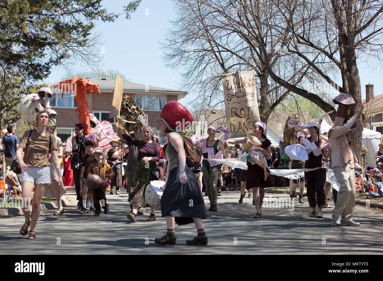 People wearing mushroom costumes at the May Day parade and festival in ...