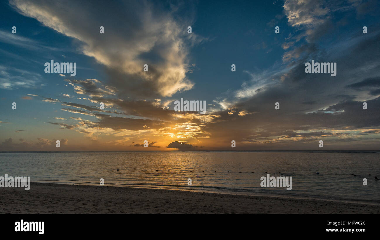 Sunset on the beach on Mauritius island Stock Photo - Alamy