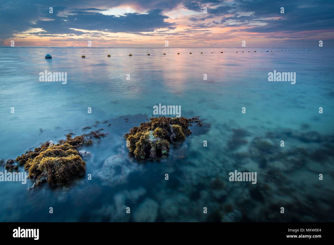 Sunset on the beach on Mauritius island Stock Photo - Alamy