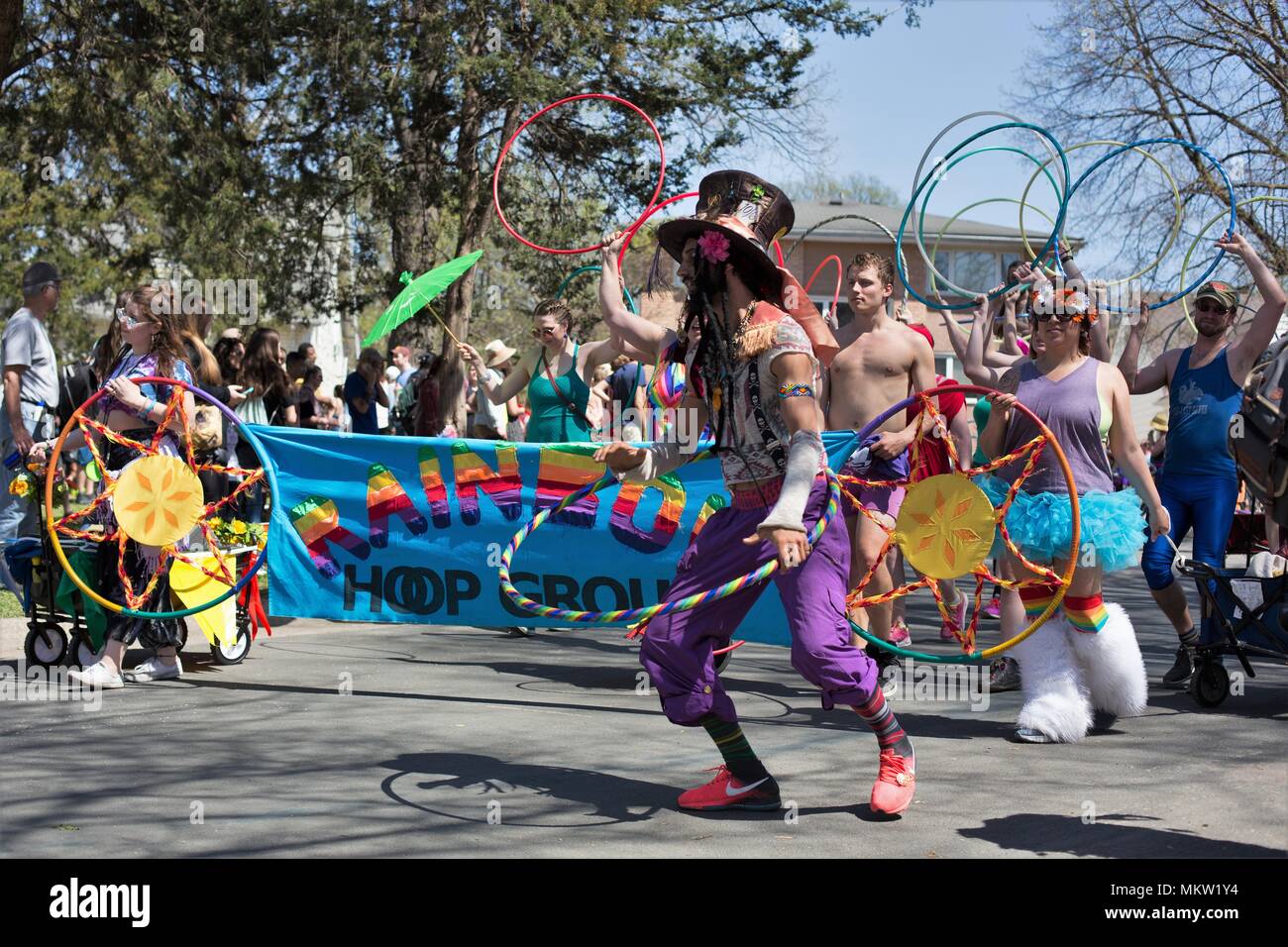 The Rainbow Hoop Group performing at the May Day parade and festival in ...