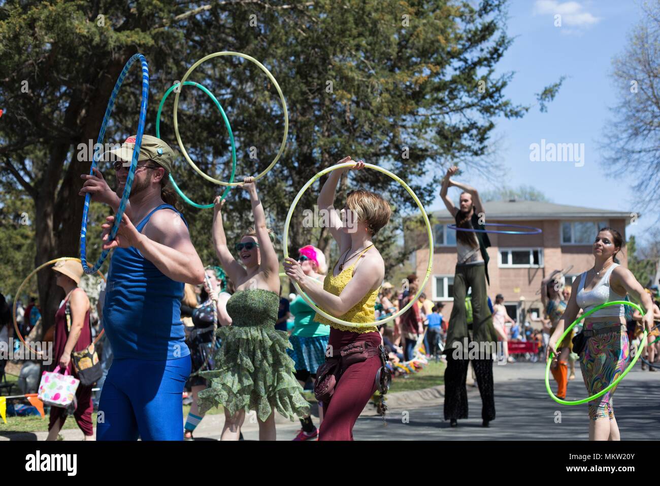 The Rainbow Hoop Group performing at the May Day parade and festival in ...