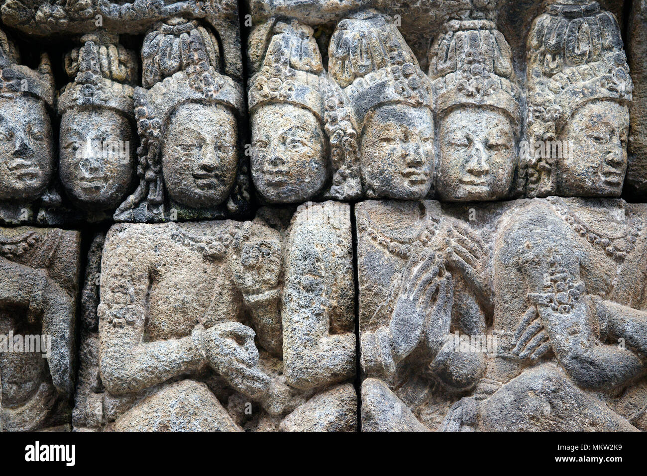 Close-up panel of figures in stone bas-relief carving Borobudur 9th ...