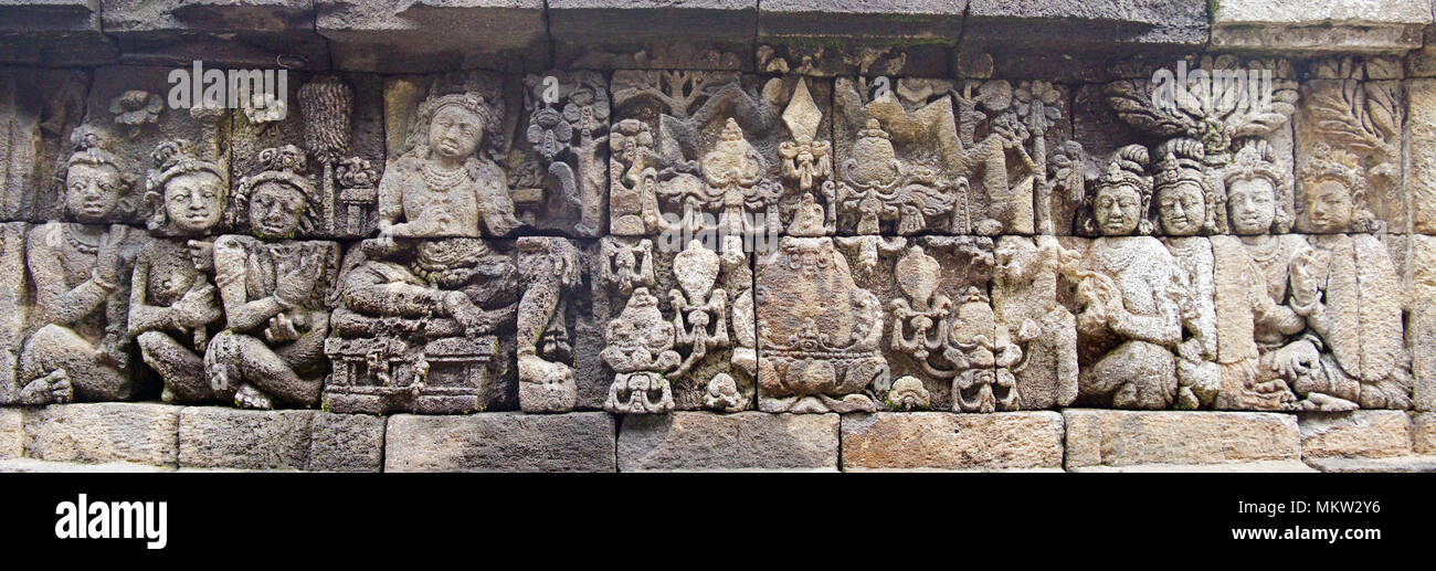 Panoramic scene in stone bas-relief carving Borobudur 9th century ...