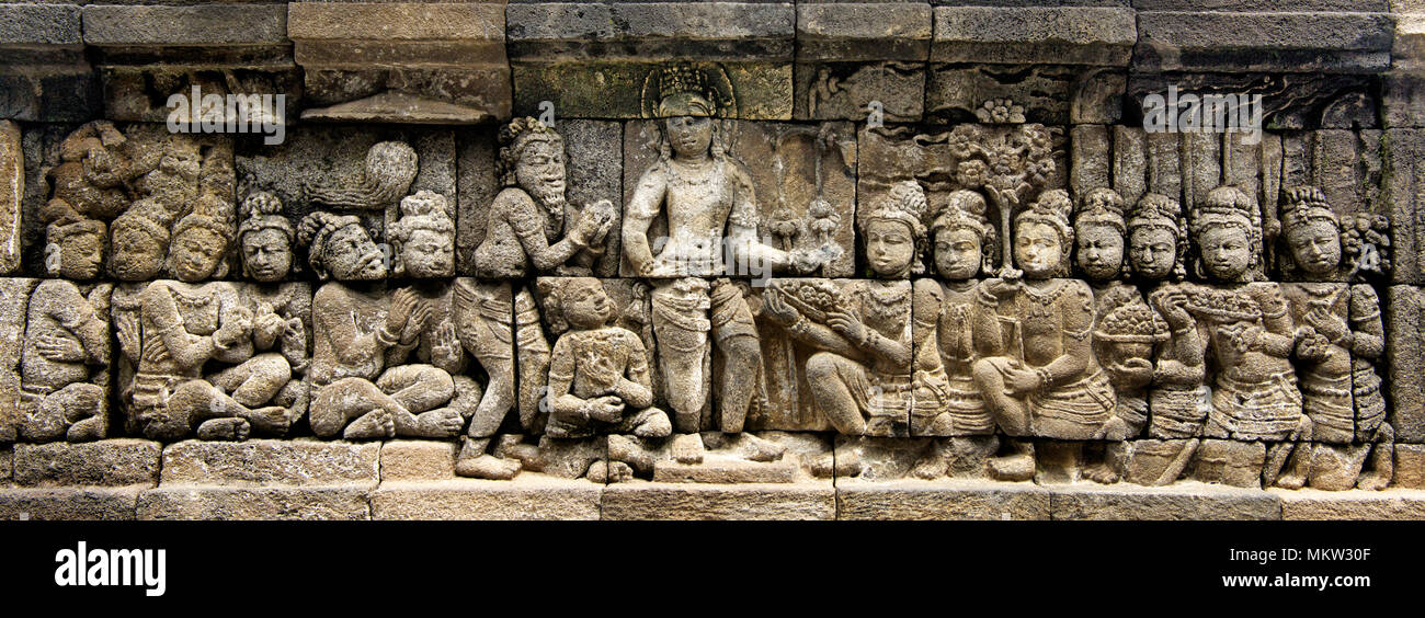 Panoramic scene in stone bas-relief carving Borobudur 9th century ...