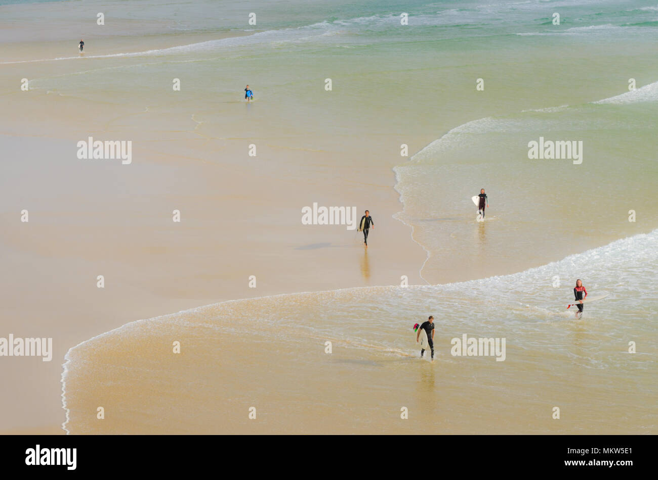 Aerial surfers surfing along coast hi-res stock photography and images ...
