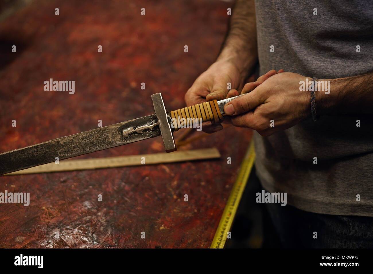 Hand On Sword Hilt High Resolution Stock Photography and Images - Alamy
