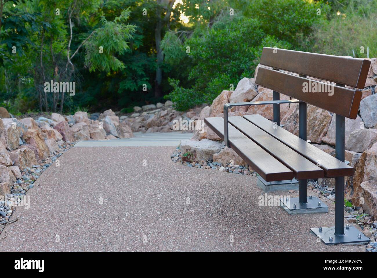 A wooden park bench at jezzine barracks hi-res stock photography and ...