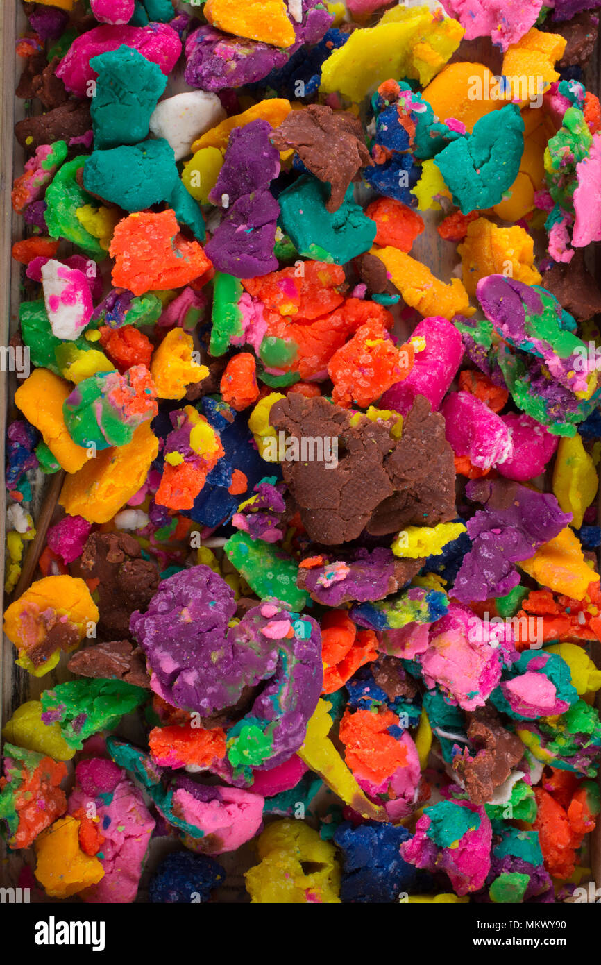 Dry colorful play dough in smal pieces Stock Photo - Alamy