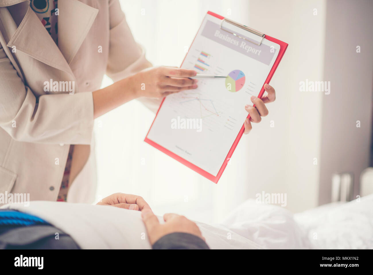 Sick Businessman are working on Hospital Bed with secretary women, Work ...