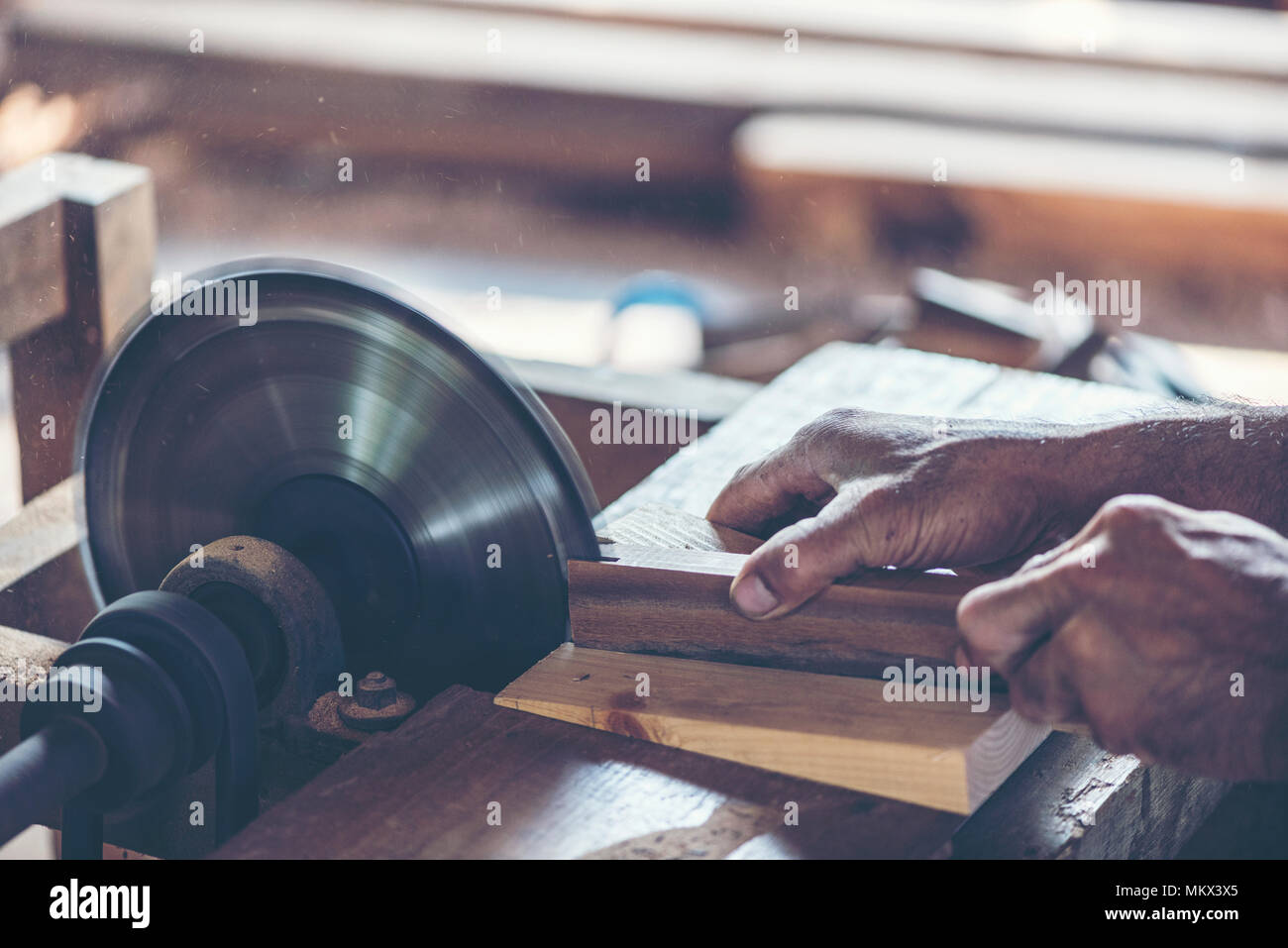 Background image of woodworking workshop: carpenters work table with ...
