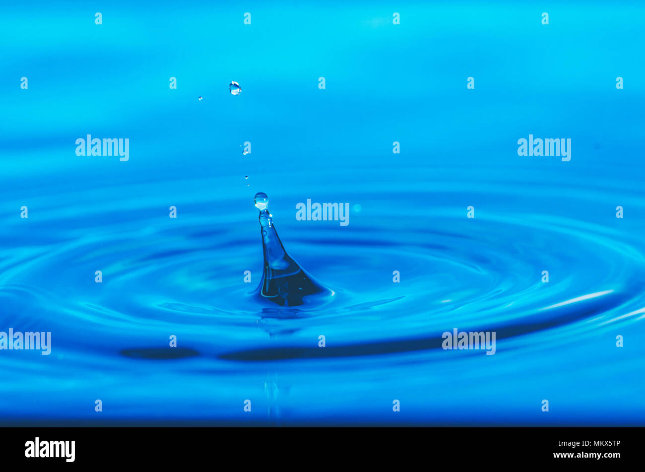 abstract background of Blue water drop falling down Stock Photo - Alamy