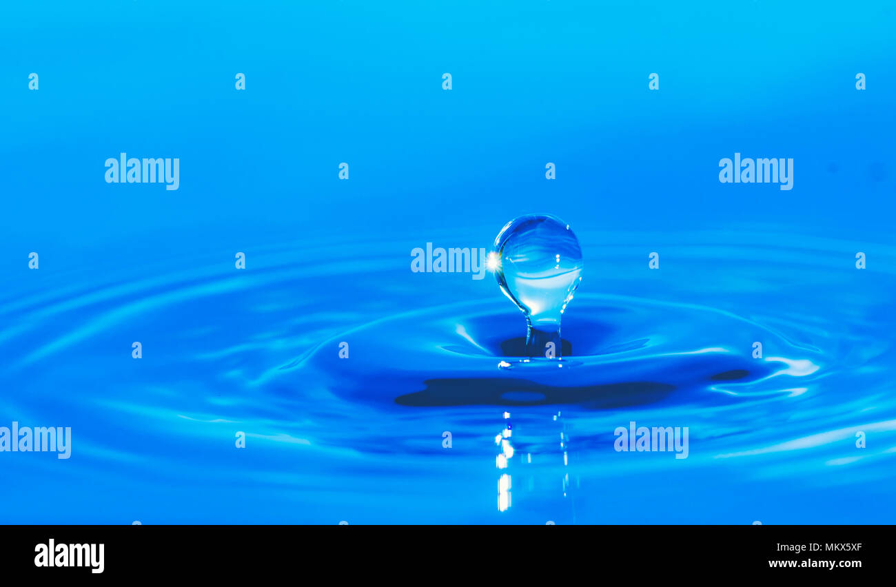 abstract background of Blue water drop falling down Stock Photo - Alamy