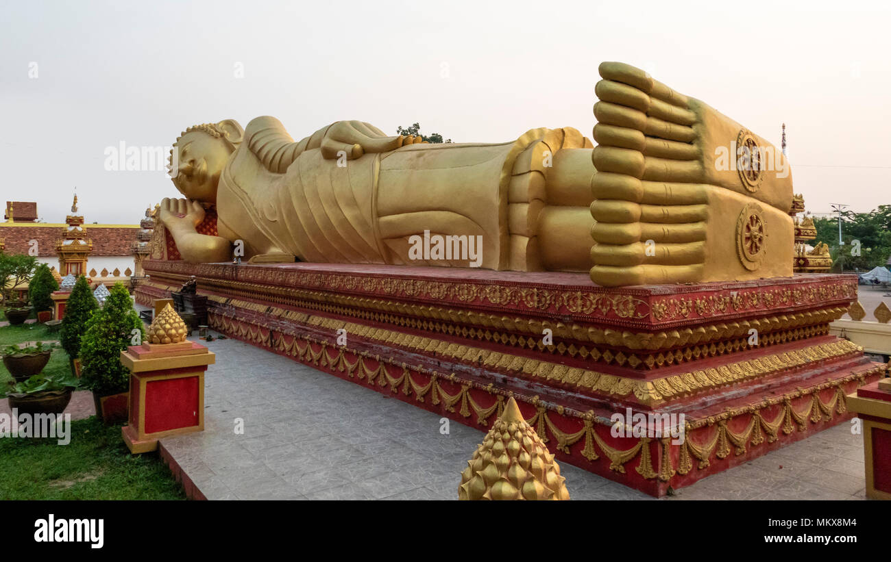 Reclining Buddha at Pha That Luang. The Pha That Luang is the most ...