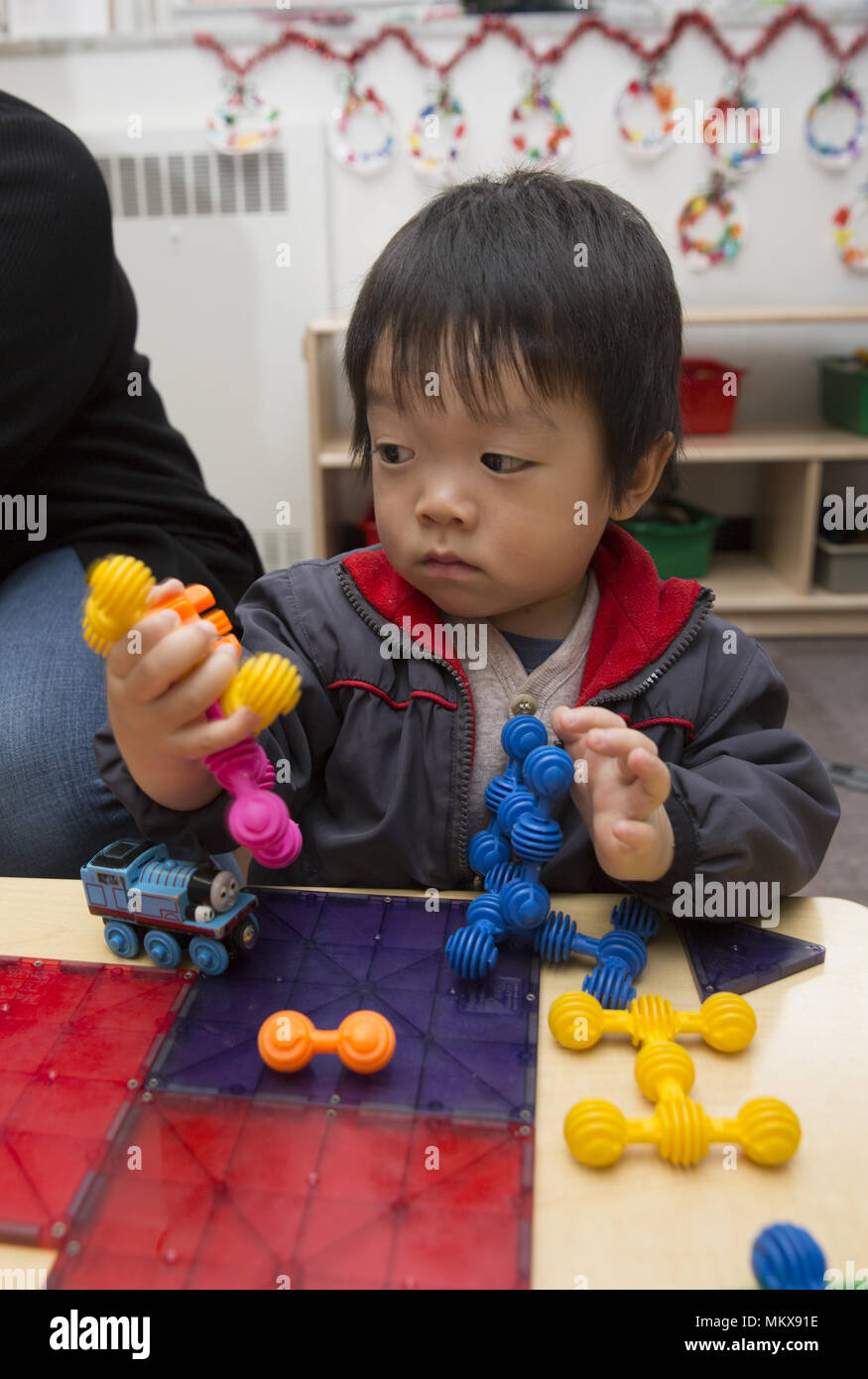 Child Playing Alone At School