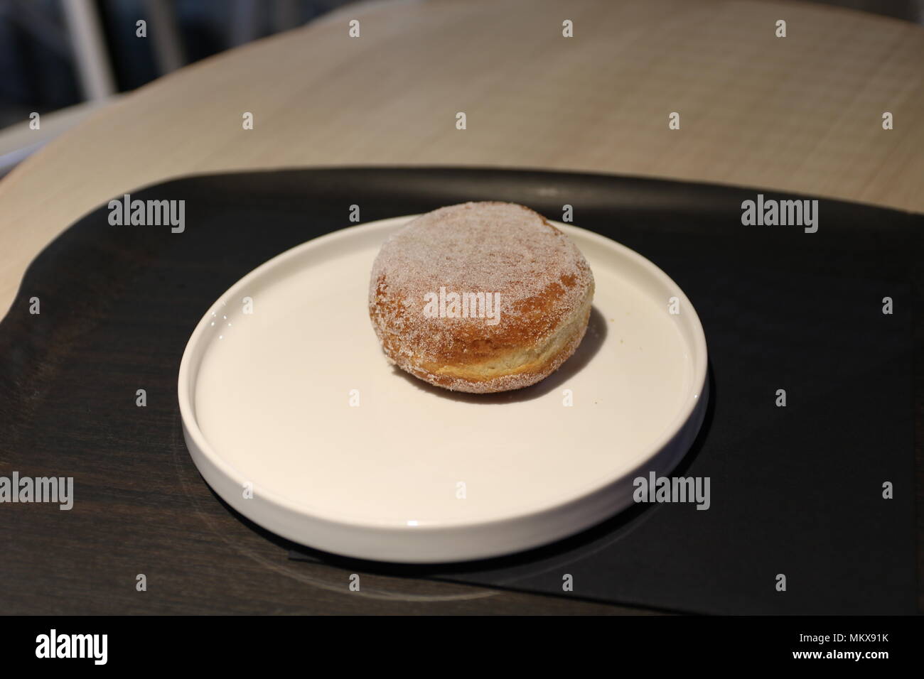 Donut on a plate Stock Photo - Alamy