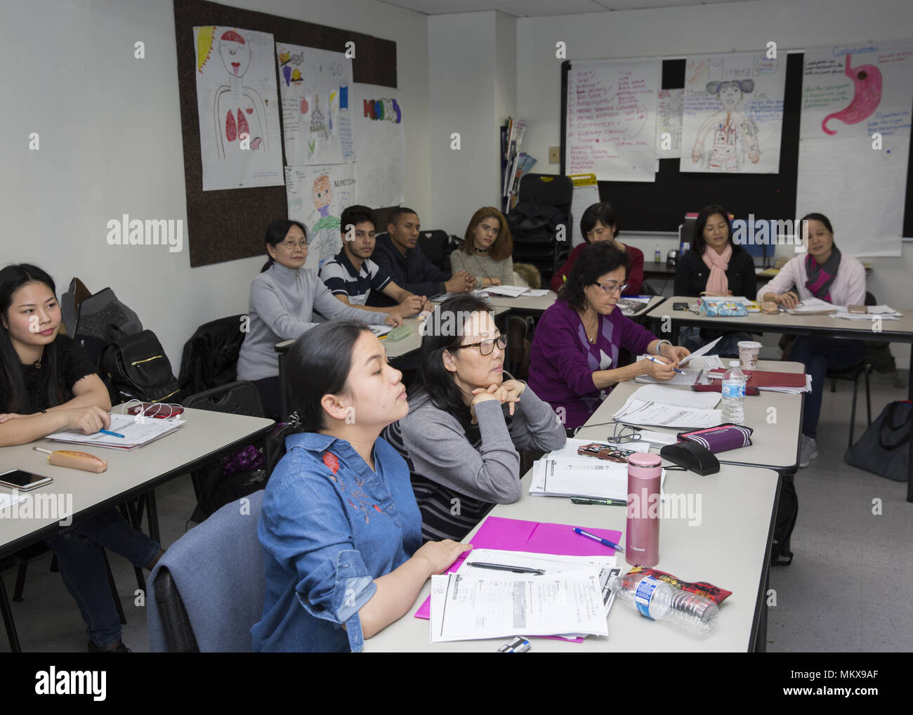 Adults learning a second language hi-res stock photography and images ...