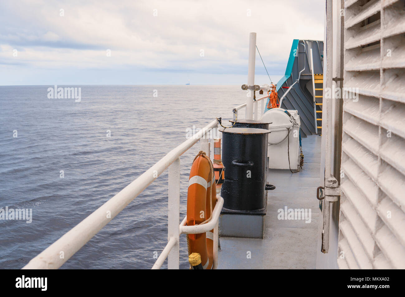 Front view of ocean boat or vessel sailing through calm sea. Freedom ...