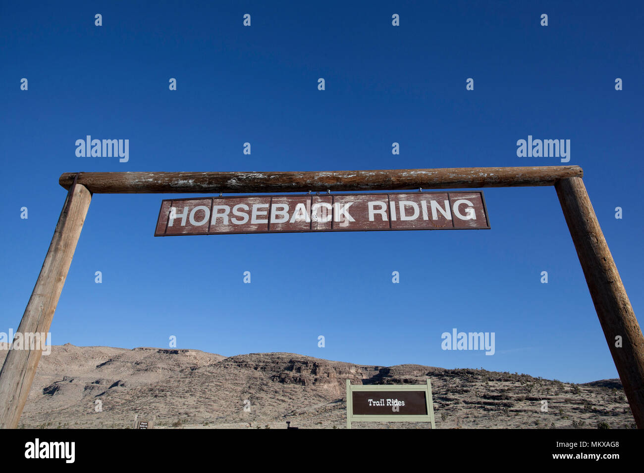 Wooden rustic horseback riding sign at a Nevada dude ranch Stock Photo ...
