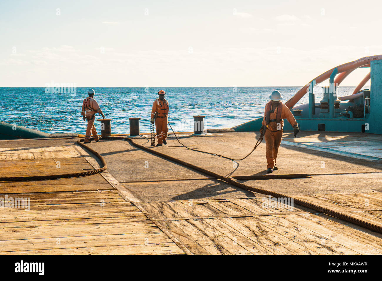 AHTS vessel doing static tow tanker lifting. Ocean tug job Stock Photo ...