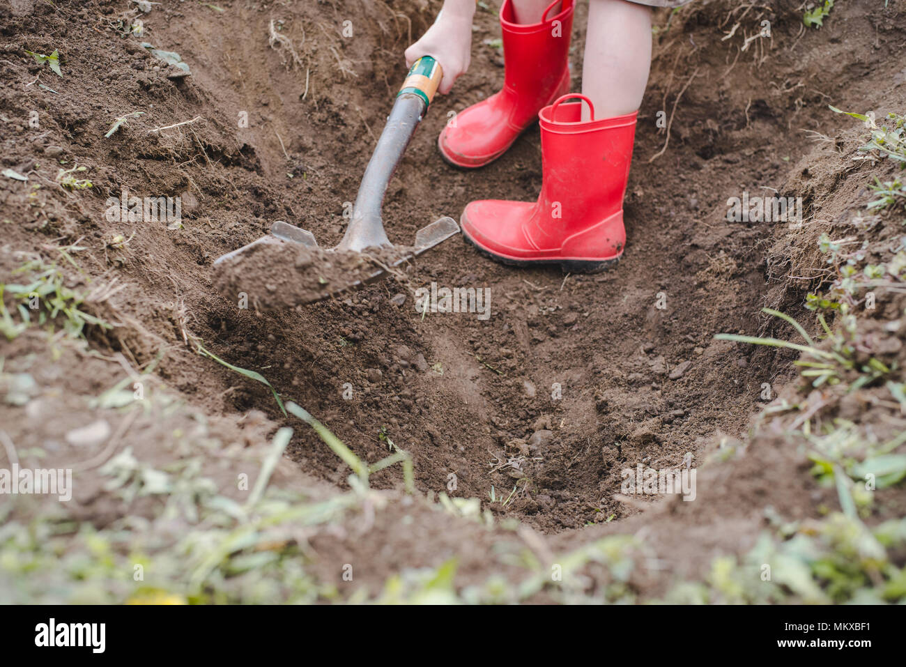 Children digging in dirt hi-res stock photography and images - Alamy