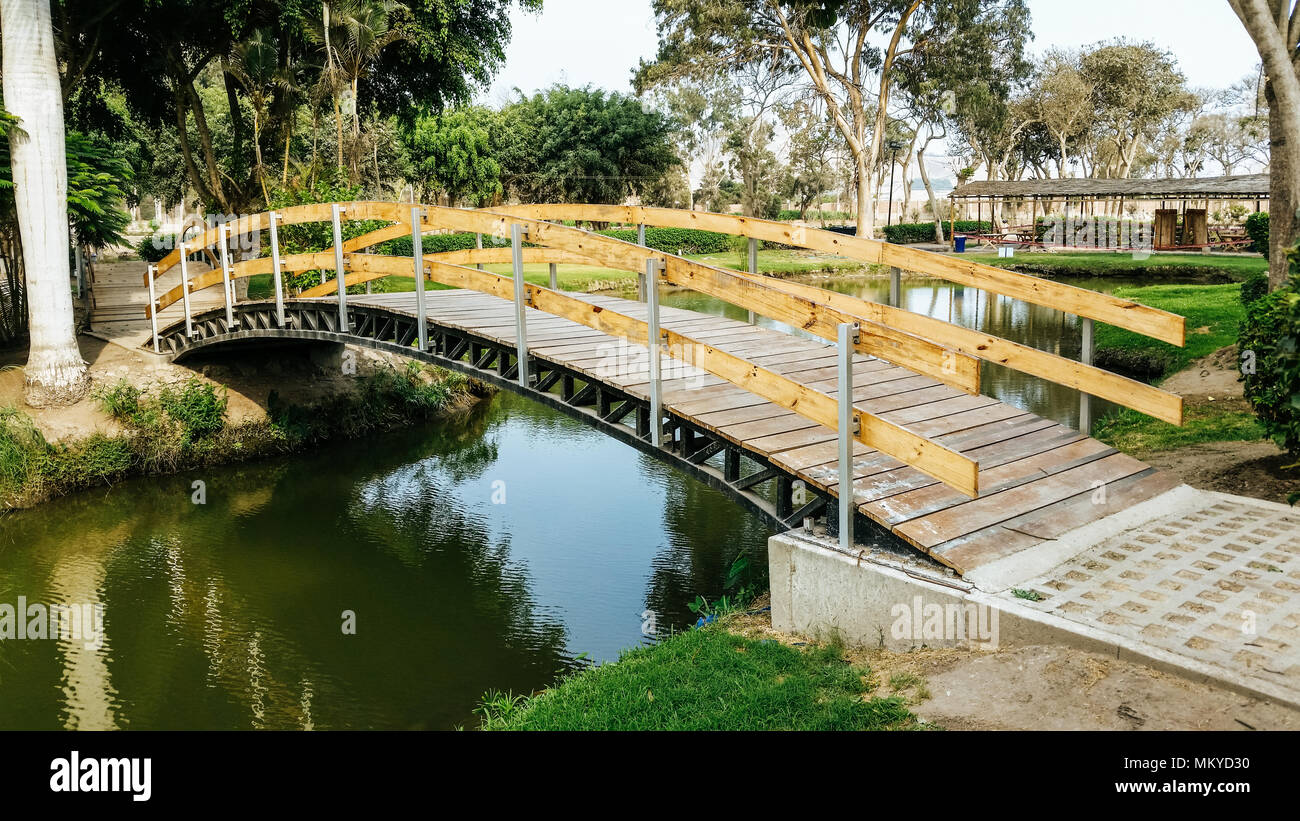 Bridge over a lake Stock Photo - Alamy