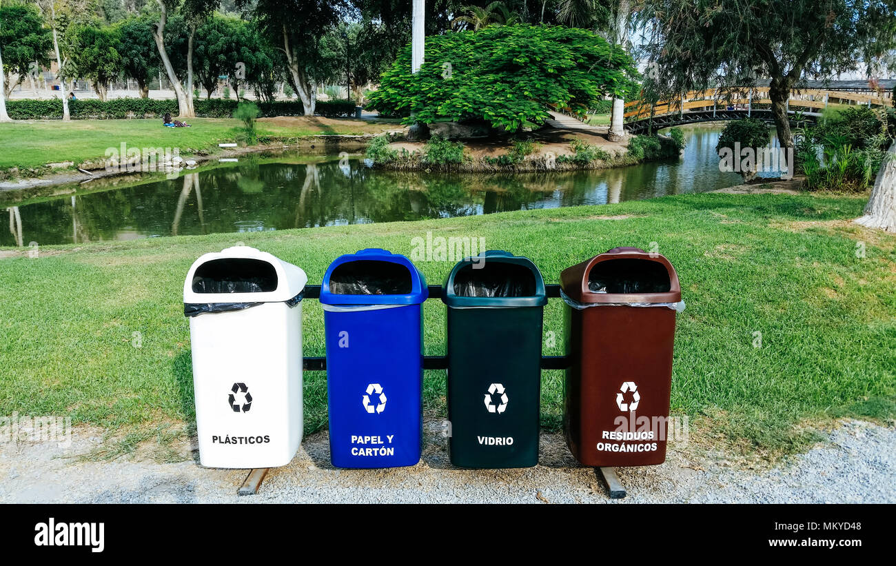 Different Colored Bins For Collection Of Recycle Materials Stock Photo ...