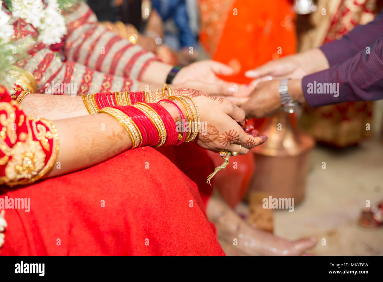 Hindu Nepali Bride and groom's Hands on the wedding day Stock Photo - Alamy