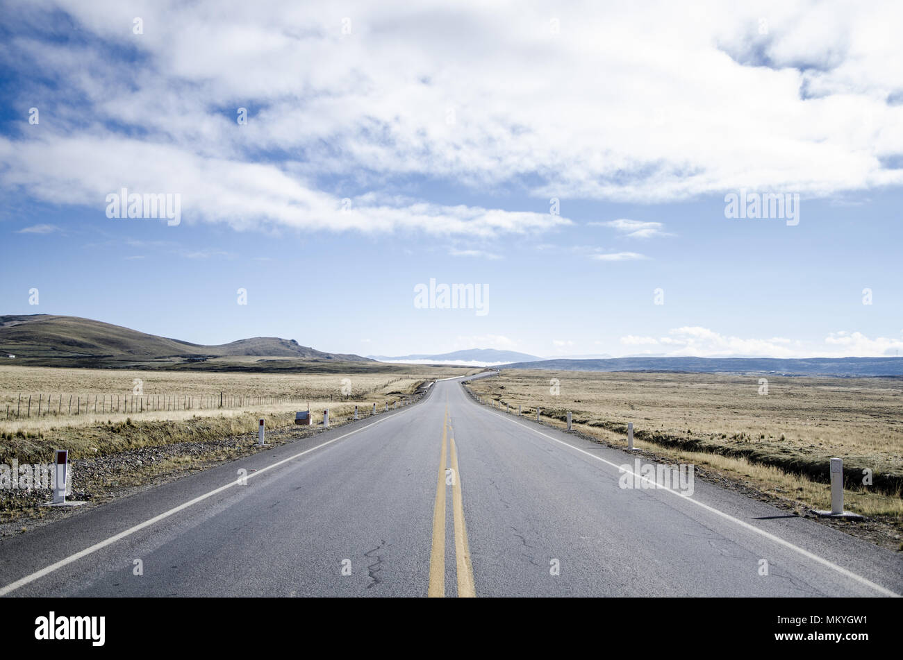 Long road on highway Stock Photo - Alamy