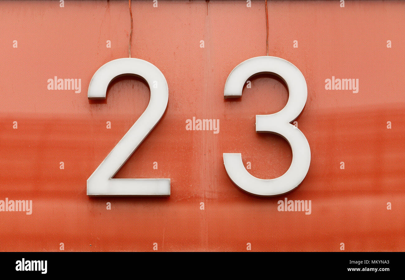 Number twenty three isolated on a red background Stock Photo - Alamy