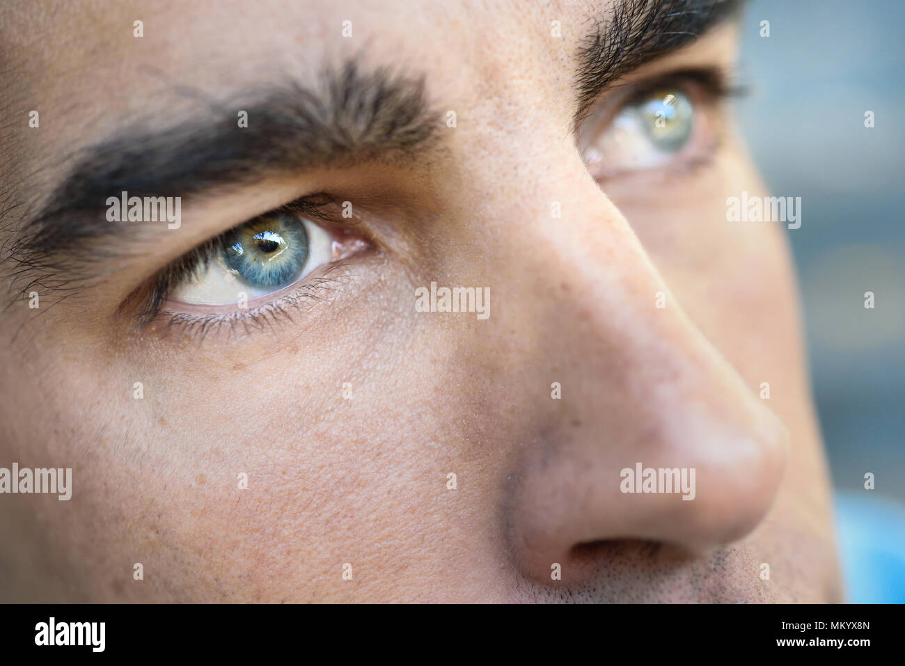 Close-up shot of man's eye. Man with blue eyes Stock Photo - Alamy